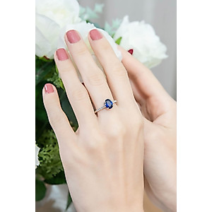 B. BRILLIANT Sterling Silver Created Blue Sapphire and White Topaz Oval Crown Ring, Size 10