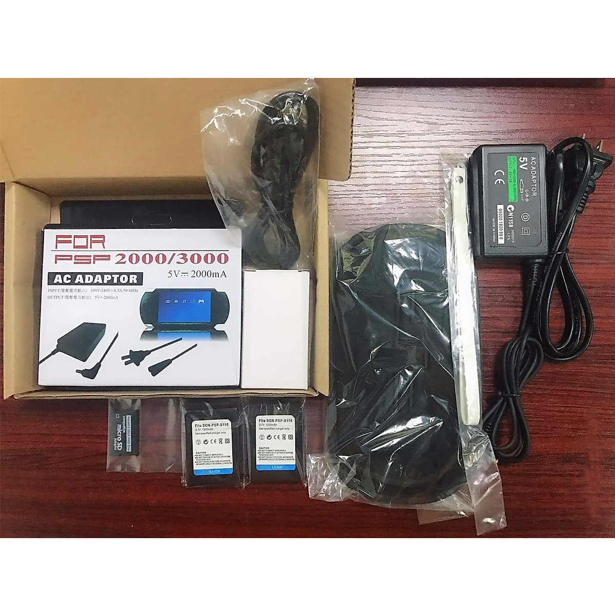 TFSeven 2Pcs PSP-S110 1200mah Rechargeable Lithium Ion Replacement Sony PSP Slim Battery + AC Adapter 5V 2A Wall Travel Power Supply Compatible for PSP 2000 2001 3000 3001 3004 Accessories Bundle Kit