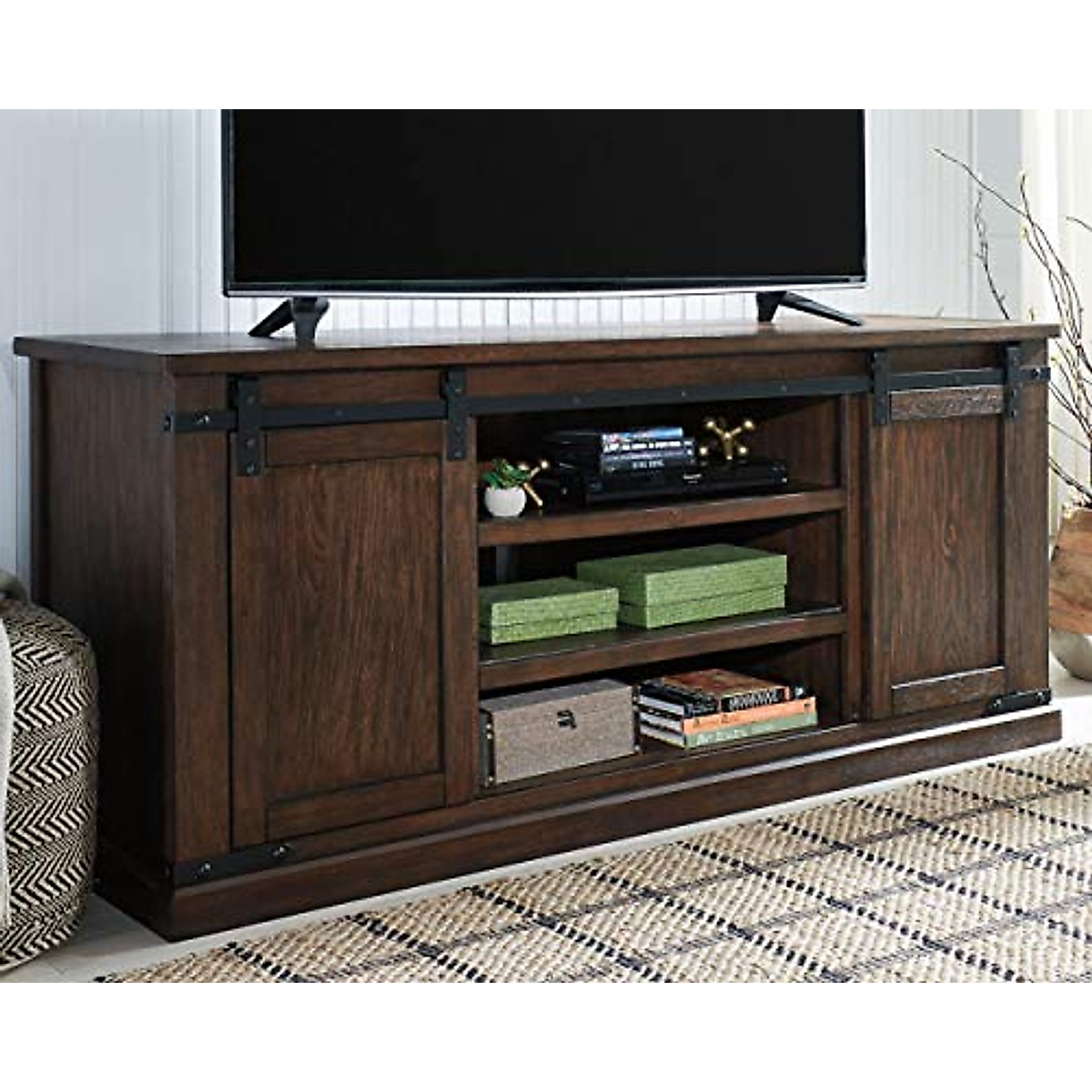 Signature Design by Ashley Budmore Rustic TV Stand Fits TVs up to 68", 2 Sliding Barn Doors and 6 Storage Shelves, Dark Brown