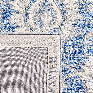 SAFAVIEH Micro-Loop Collection Accent Rug - 2' x 3', Blue & Ivory, Handmade Wool, Ideal for High Traffic Areas in Entryway, Living Room, Bedroom (MLP536M)