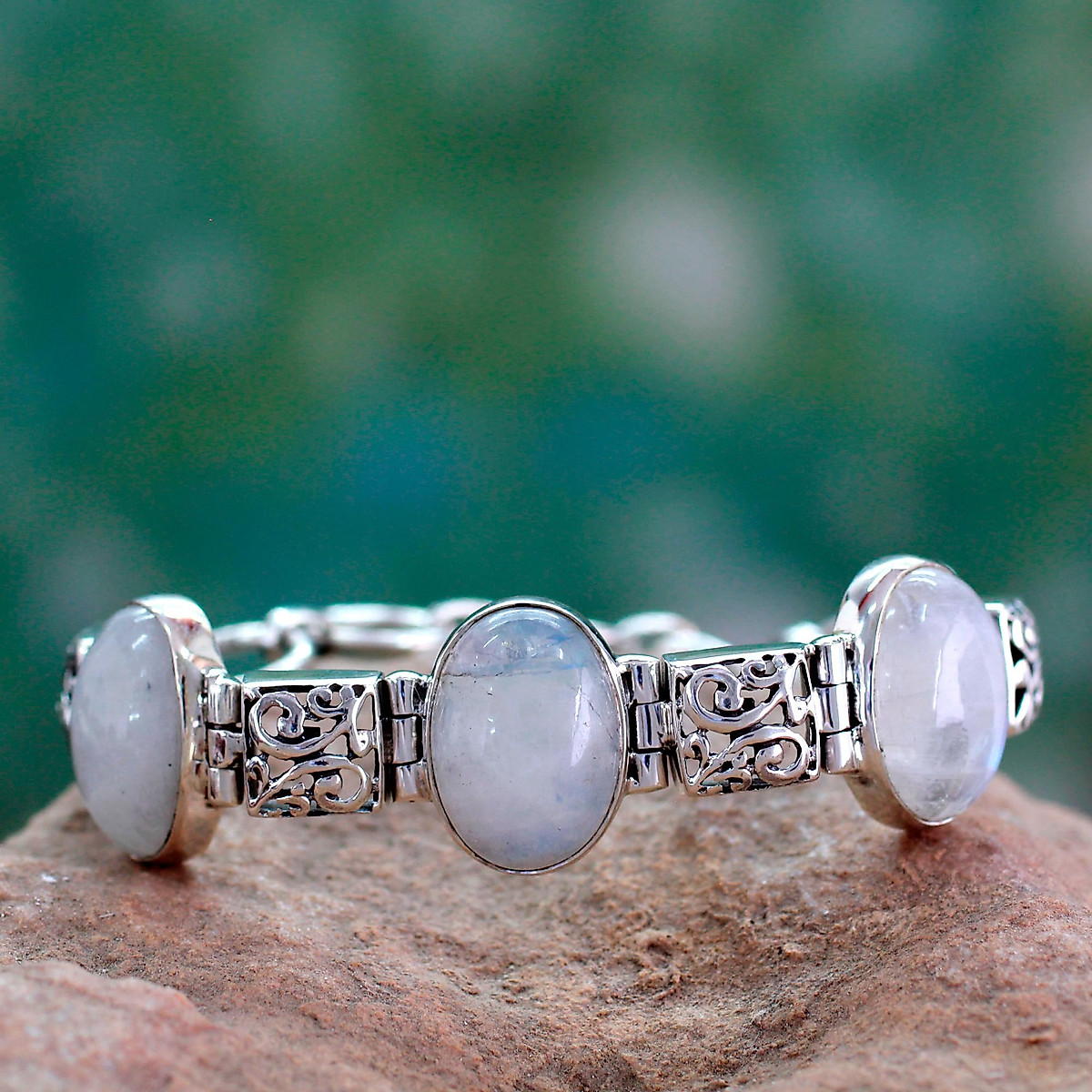 NOVICA Artisan Handmade Moonstone Link Bracelet Artisan Crafted Sterling Silver White India Good Fortune Birthstone [6 in min L x 7.75 in max L 15 mm W] ' Floral Legends'
