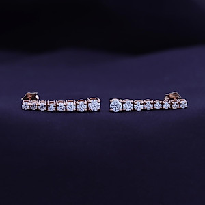 SAVEARTH DIAMONDS 1 Carat Round Cut Lab Created Moissanite Diamond Linear Drop Stud Earrings In 14K Rose Gold Over Sterling Silver Jewelry For Women (VVS1 Clarity, 1 Cttw)