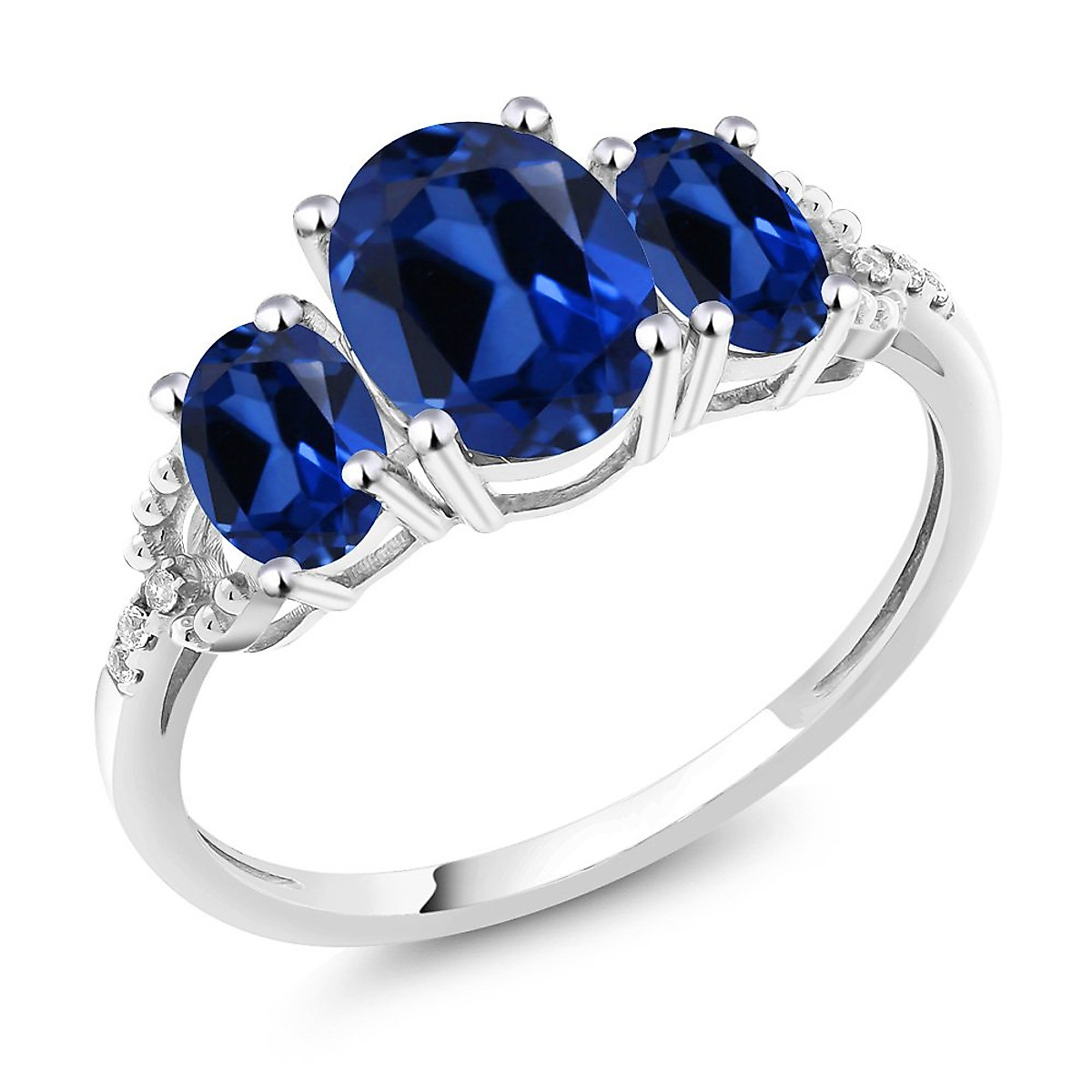 Gem Stone King 10K White Gold Oval Blue Created Sapphire and Diamond Accent 3-Stone Women Engagement Ring (2.65 Cttw) (Size 8)
