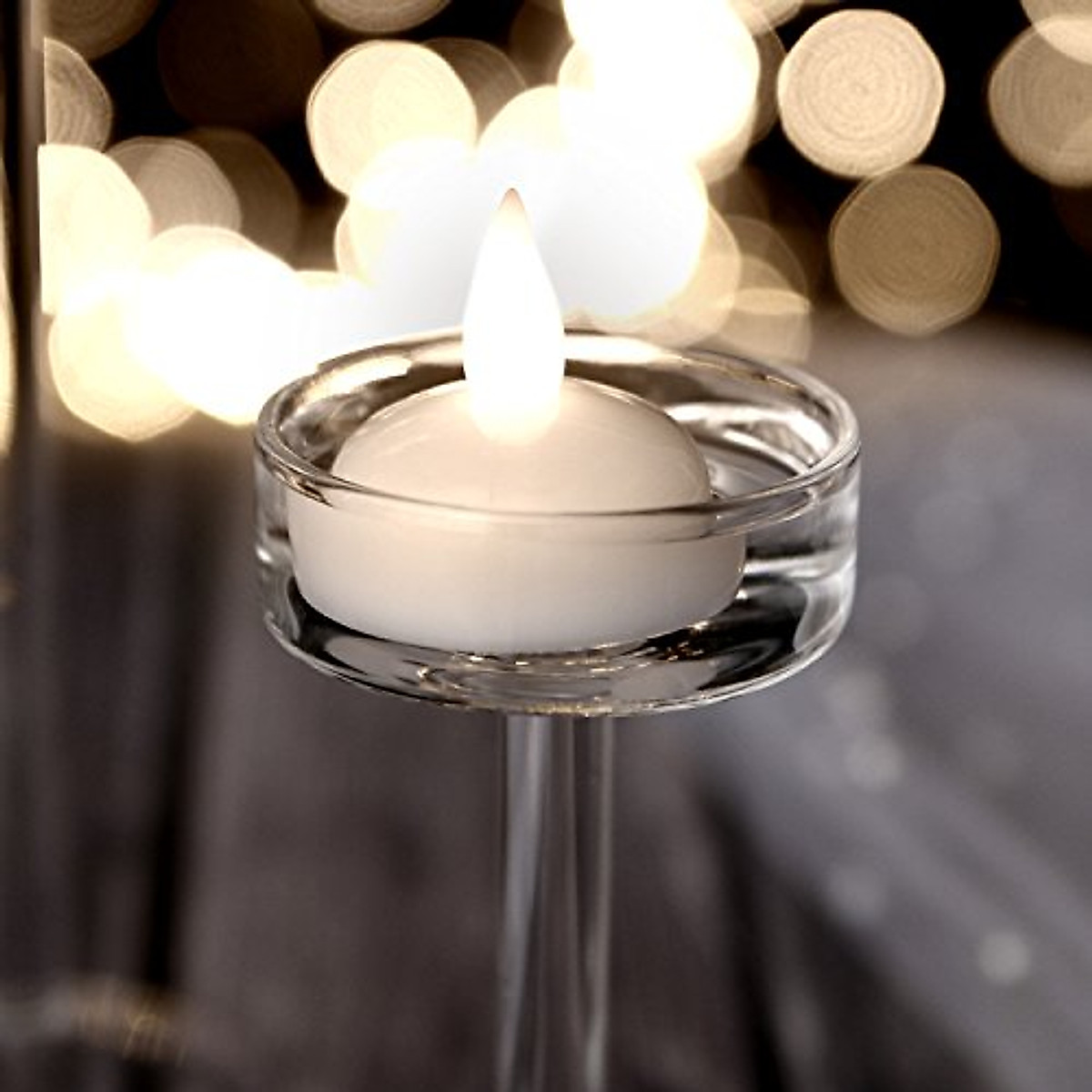 AGPTEK 12 PCS Waterproof Tea Lights, Battery Operated Flameless Floating Candles for Wedding Party Decoration - Warm White