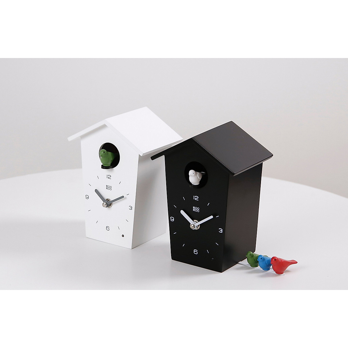 KOOKOO BirdHouse mini black, tiny modern cuckoo clock with 12 natural bird songs or cuckoo call