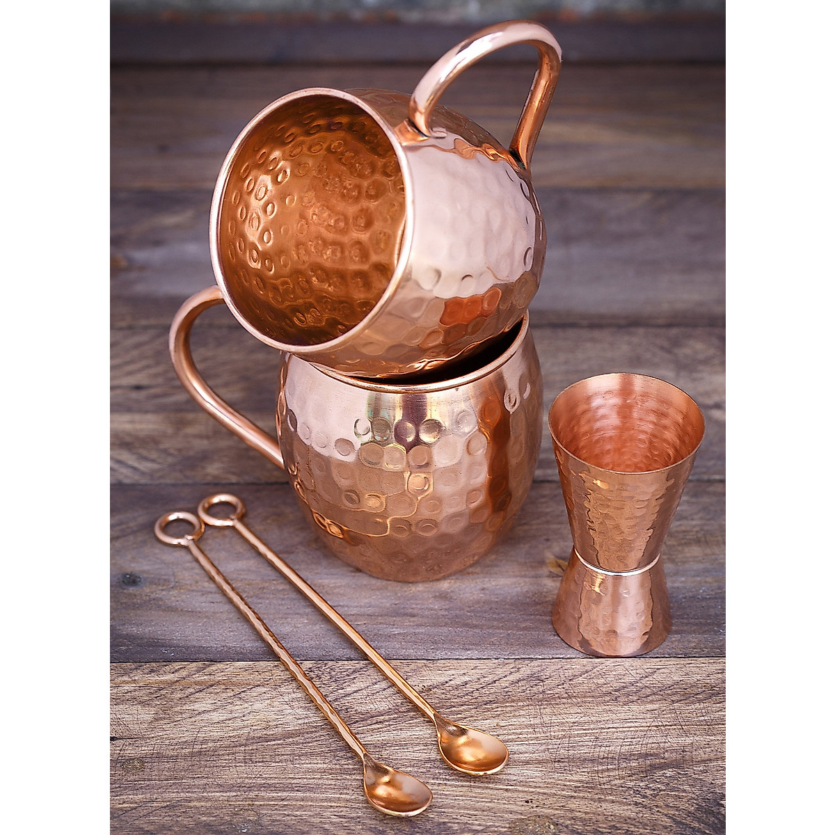 Copper jigger lacquered for the shine and to prevent tarnish. - Double 1oz/2oz copper measuring jigger for cocktail mixing. - Solid hammered copper 22G copper. - Copper shot glass for Moscow mule.