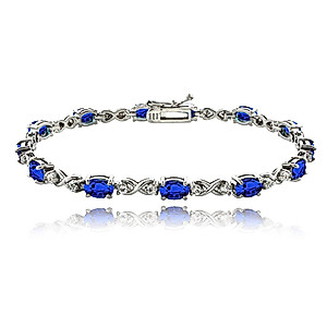 B. BRILLIANT Sterling Silver Created Blue Sapphire 6x4mm Oval Infinity Bracelet with White Topaz Accents