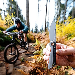 Kershaw Esteem Folding Pocket Knife, 2.5 inch Bead Blasted Stainless Steel Blade, Black and Silver Handle with Bronze Detents, Nail Nick, Pocketclip