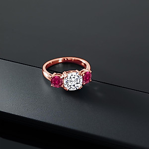 18K Rose Gold Plated Silver Forever Classic Moissanite From Charles & Colvard and Red Created Ruby 3 Stone Engagement Ring For Women (3.70 Cttw, Gemstone, Cushion 8MM, Size 5)