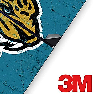 Skinit Decal Gaming Skin Compatible with PS4 Console - Officially Licensed NFL Jacksonville Jaguars Distressed Design