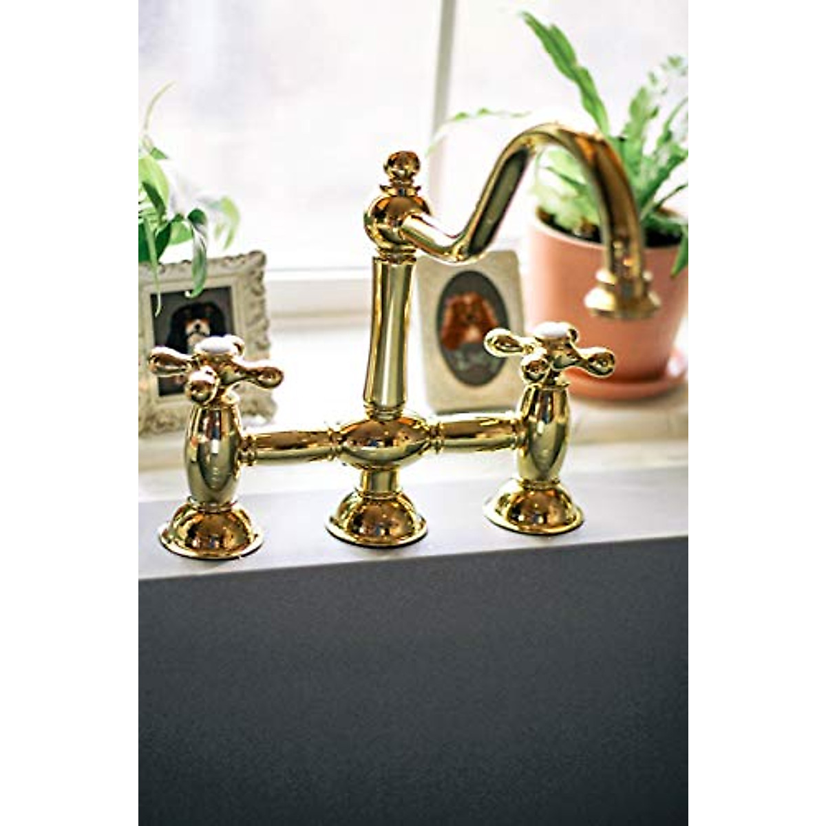 Kingston Brass KS3792AXBS Restoration Bridge Kitchen Faucet, 9", Polished Brass