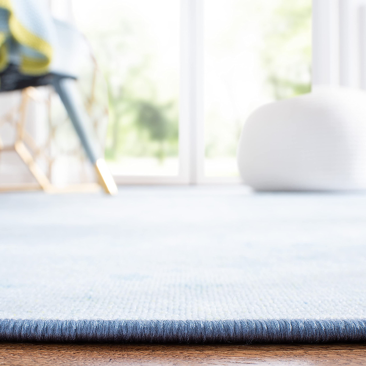 SAFAVIEH Disney Princess Collection Machine Washable Slip Resistant 5' x 7' Light Blue/Blue Iconic Kids Bedroom Nursery Playroom Area Rug