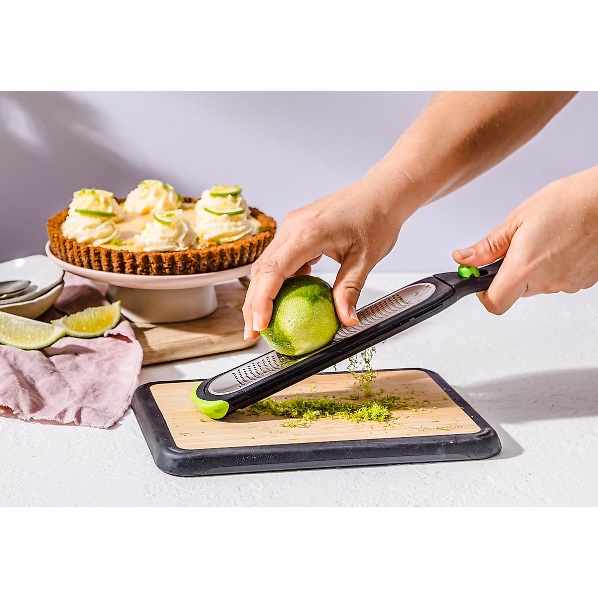 Dreamfarm Ozest Self-Cleaning POP-Button Zester for Fine, Fluffy Citrus Zest, Cheese, Nut, & Spices with Non-Slip Silicone Foot - 1mm Zester, Black/Green