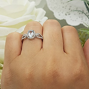 Dazzlingrock Collection Sterling Silver 7X5 MM Oval Aquamarine & Round White Diamond Bridal Halo Engagement Ring, Size 9