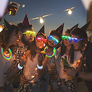 125 Pack New Years Eve Glow in The Dark Party Supplies Light Up Party Favors with 100 Glow Sticks and 25 Led Glasses Shutter Shades Sunglasses Neon Accessories for Kid Adult New Years Birthday Wedding