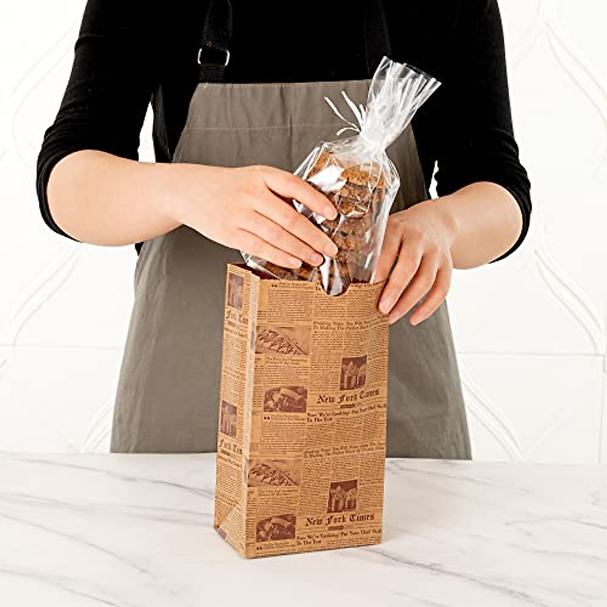 Restaurantware Bag Tek 4 Lb Disposable Lunch Bags 100 Sturdy Take Out Bags - Flat Bottom Microwavable Kraft Newsprint Design Paper Bags Freezable Great For Restaurants Cafes And Bakeries