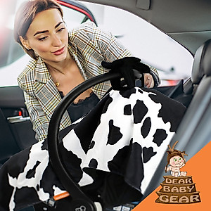 Dear Baby Gear Black and White Holstein Cow Baby Car Seat Canopy with Snap Button Opening and Puffy Bows— Layered Lightweight Cover Keeps Babies Cozy and Sheltered — 40 x 30 Inches