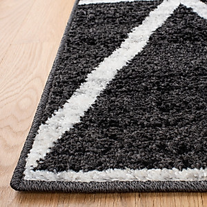 SAFAVIEH Adirondack Collection Area Rug - 5'1" x 7'6", Black & Ivory, Modern Geometric Design, Non-Shedding & Easy Care, Ideal for High Traffic Areas in Living Room, Bedroom (ADR262G)