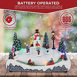 Animated Christmas Village Skating Pond - Lighted Musical Snow Scene with 4 Moving Skaters, Adapter, Battery Slot