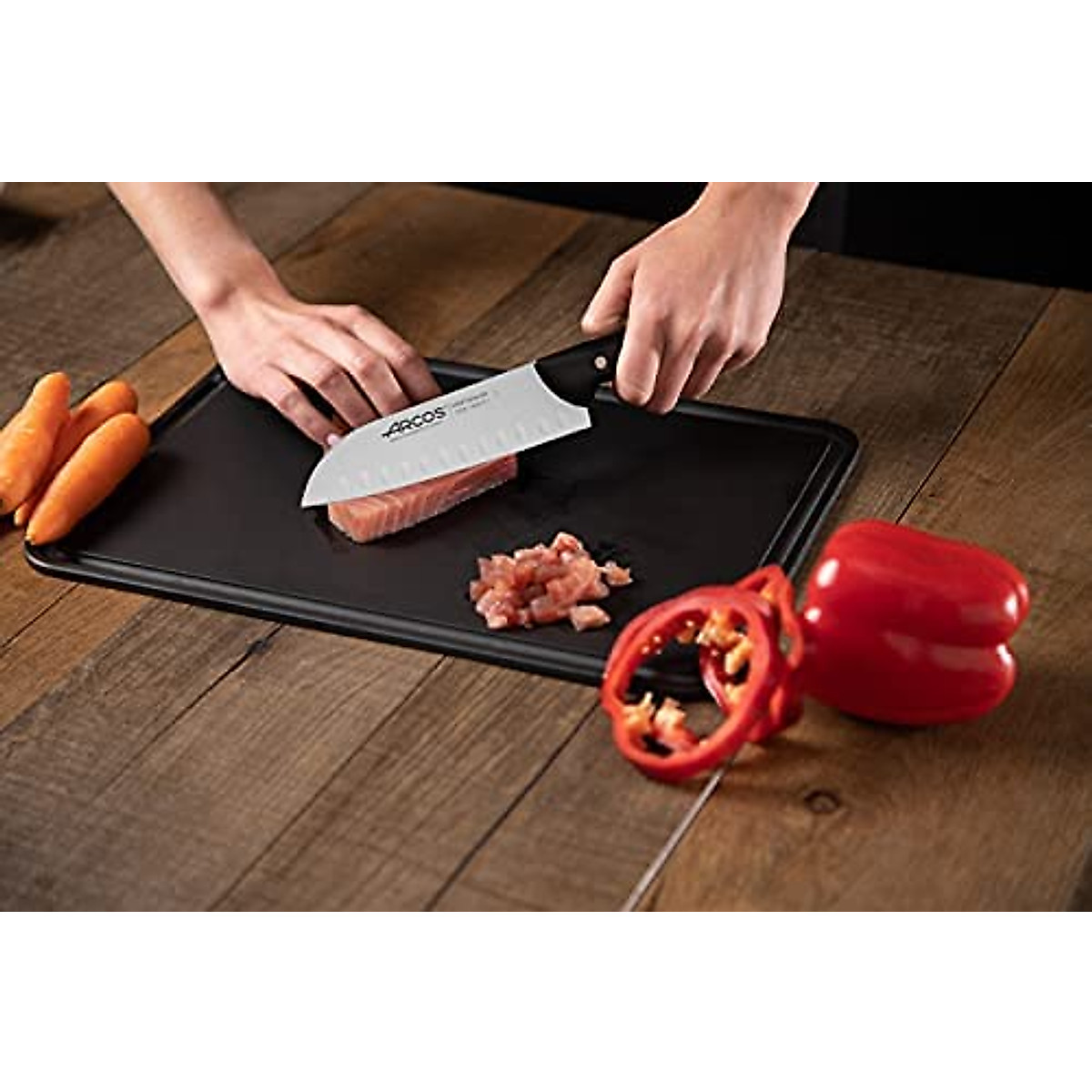ARCOS Santoku Knife 7 Inch Nitrum Stainless Steel. Japanese Kitchen Knife for Fish, Meat and Vegetables. Ergonomic Polyoxymethylene POM Handle and 170 mm blade. Multi-use. Series Maitre. Color Black