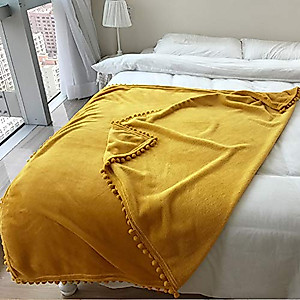 LOMAO Flannel Blanket with Pompom Fringe Lightweight Cozy Bed Blanket Soft Throw Blanket fit Couch Sofa Suitable for All Season (51x63) (Mustard Yellow)