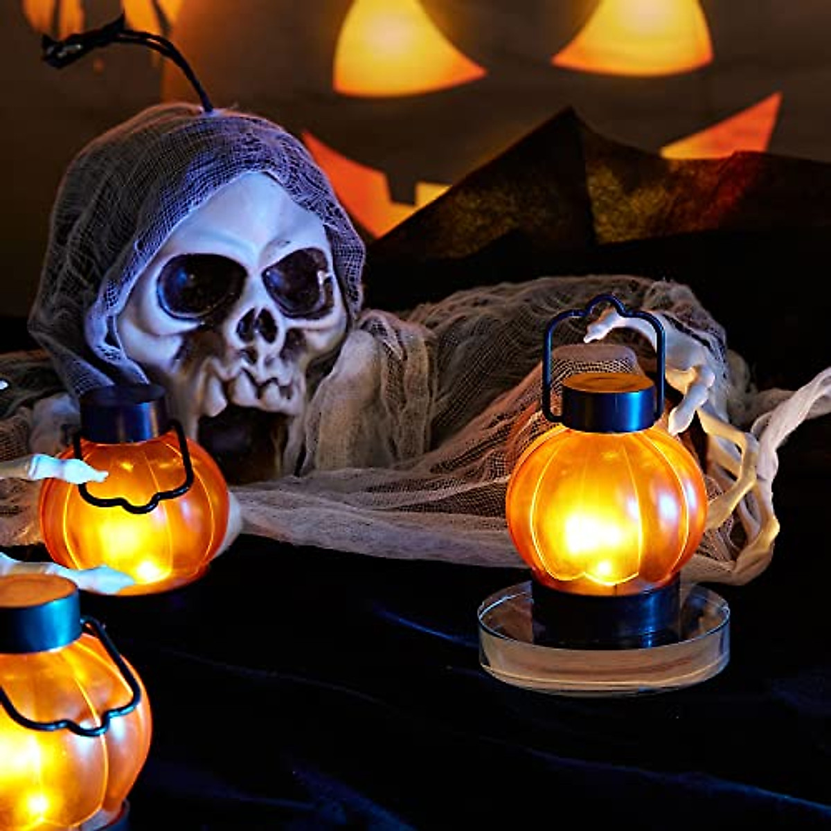 IMAGE Flickering Pumpkin Lantern Tea Lights 12 Pack Flickering LED Pumpkin Lights with Battery Operated Flameless Pumpkin Tealight Candles for Halloween, Christmas, Thanksgiving and Theme Parties