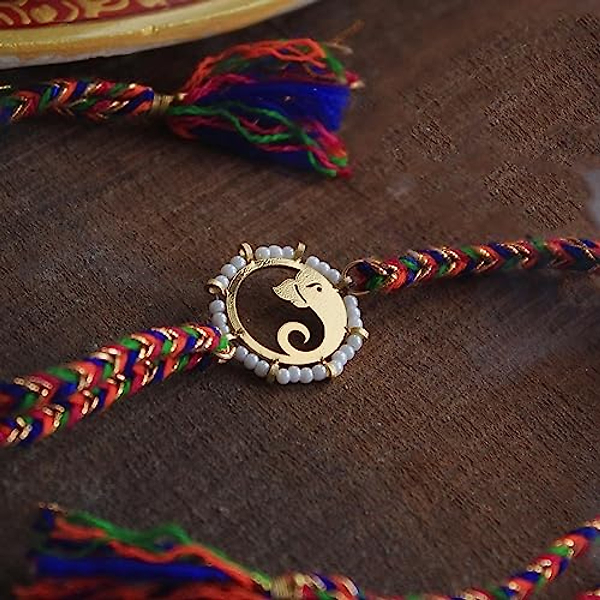 Abhika Creations Golden Beaded Divinity Rakhi for Brother Rakhsha Bandhan Handmade Designer Indian Rakhi
