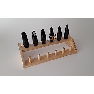 Saxophone mouthpiece wooden stand holder rack for 12 mouthpieces.