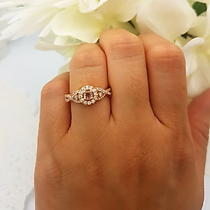 Dazzlingrock Collection Morganite,Champagne & White Diamond 3 Stone Swirl Halo Engagement Ring in 10K Rose Gold, Size 7