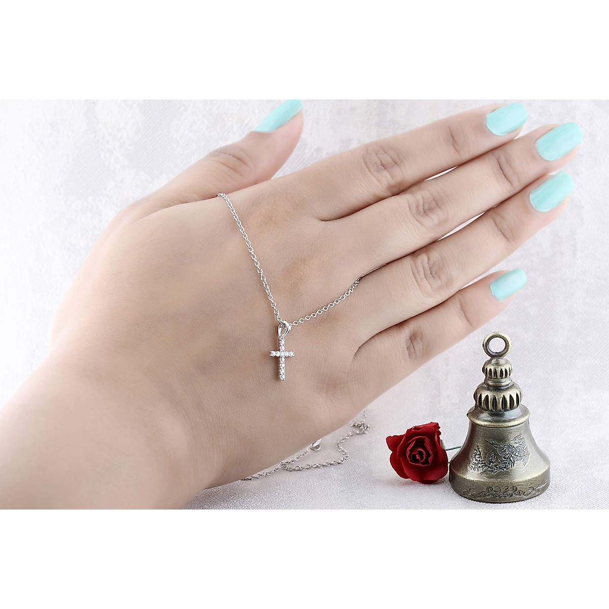 Dazzlingrock Collection Round White Diamond Classic Divine Cross of Jesus Pendant with 18 inch Silver Chain for Women (0.15 ctw, Color I-J, Clarity I2-I3) in 10K White Gold