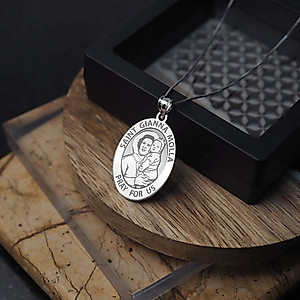 PicturesOnGold.com Saint Gianna Beretta Molla Oval Religious Medal - 2/3 X 3/4 Inch Size of Nickel, Sterling Silver with Engraving
