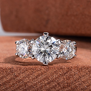 CannyCat 3 Stone Moissanite Ring for Women 5 cttw 3 carat Certified Moissanite with Side 1 carat D-color VVS Brilliant Platinum-Plated Silver Anniversary Engagement Wide Band (6.5)