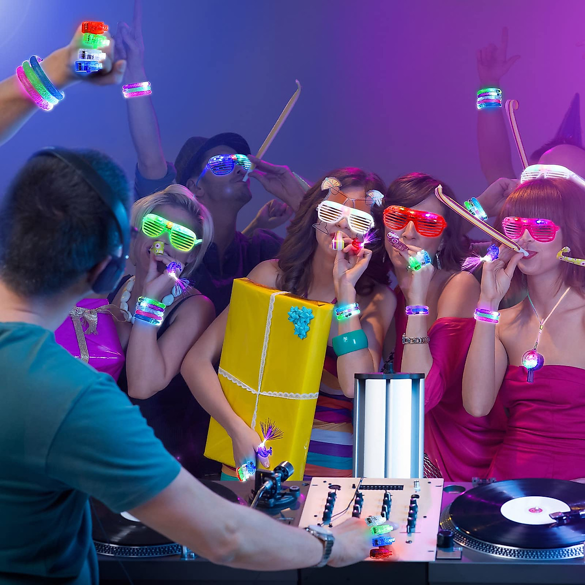 122 PCS Glow In The Dark Party Supplies Light Up Toy Party Favors with 12 Flashing Glasses LED Bracelets Flashing Hair Neon Peacock Finger Light LED Whistle Glow Hand Clappers and 50 Finger Lights