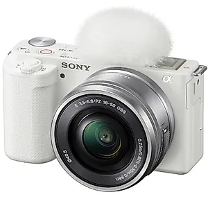 Sony ZV-E10 Mirrorless Camera (White) w/E PZ 16-50mm f/3.5-5.6 OSS Lens + E 55-210mm f/4.5-6.3 OSS Lens + 2X 64GB Memory + Case + Filters + Tripod & More (35pc Bundle) (Renewed)