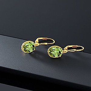 Gem Stone King 18K Yellow Gold Plated Silver Green Peridot Leverback Dangle Earrings For Women (4.20 Cttw, Gemstone August Birthstone, Oval 9X7MM)