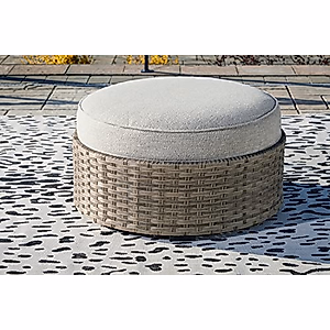 Signature Design by Ashley Outdoor Calworth Patio Wicker Ottoman with Cushion, Beige