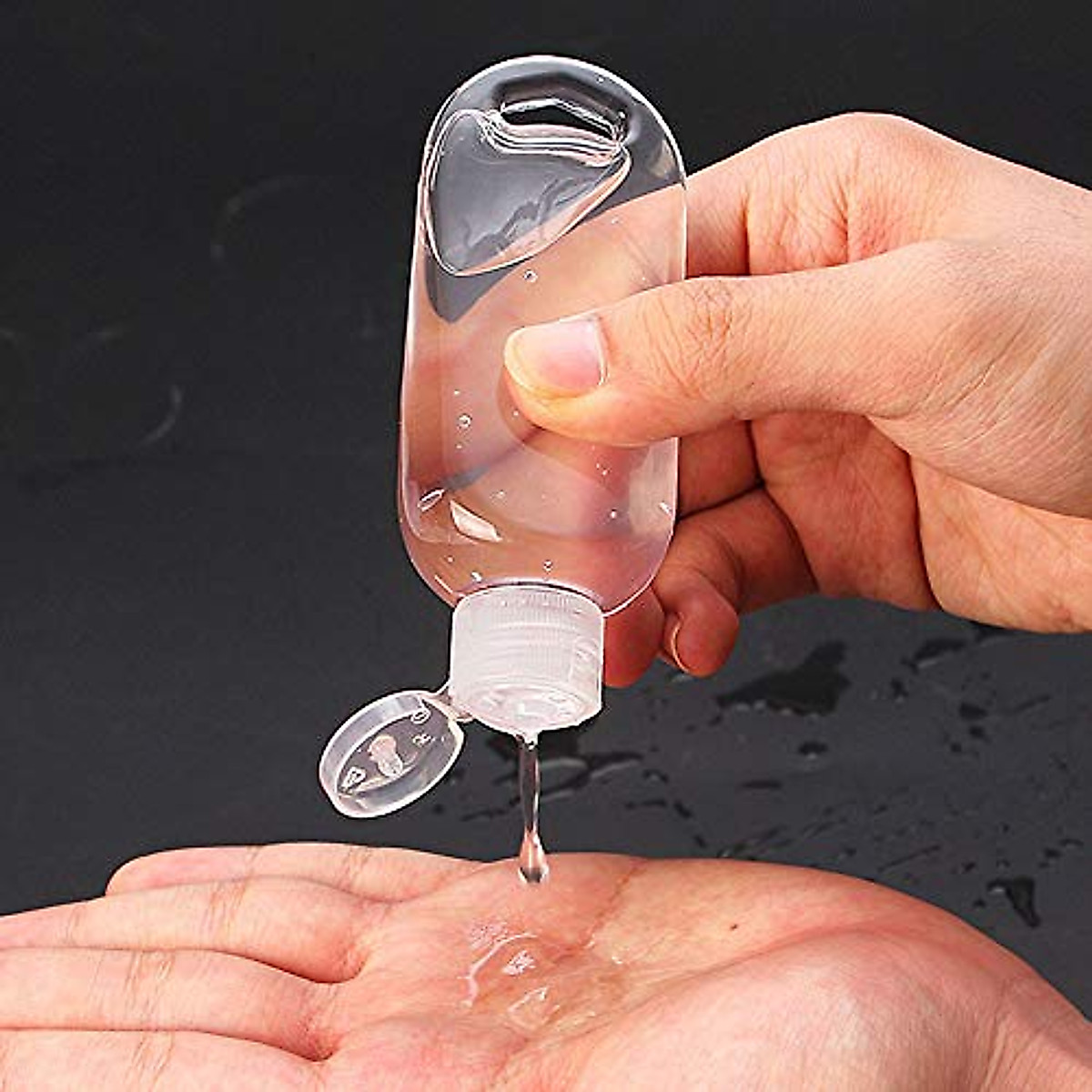 HATTIE 50Pack Travel Plastic Clear Keychain Bottles 50ml/2oz Portable Leakproof Squeeze Small Bottles With Flip Cap Refillable Empty Containers for Lotion Soap Toiletry