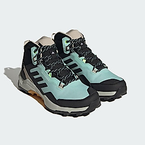 adidas Women's Terrex AX4 Mid Gore-Tex Sneaker, Semi Flash Aqua/Core Black/Preloved Yellow, 11