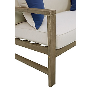 Signature Design by Ashley Outdoor Fynnegan Patio Eucalyptus Loveseat & Coffee Table, Beige with Blue Pillows