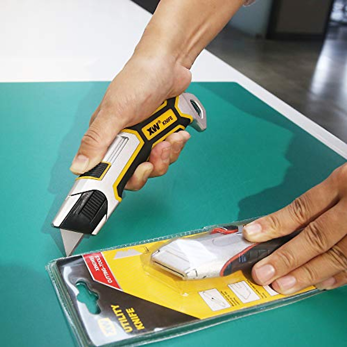 XW Auto-Retractable Safety Utility Knife, Box Cutter of Quick Blade Change, 4 Spare Blades Storage in Handle