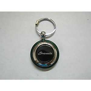 1975 1976 1977 1978 1979 1980 1981 1982 GRANADA SCRIPT LOGO ROUND PLASTIC KEYCHAIN - GREEN