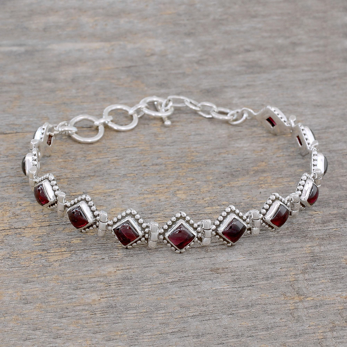 NOVICA Artisan Handmade Garnet Tennis Bracelet Red Artisan Crafted India Silver Sterling Style Birthstone [7.75 in min L x 8.5 in max L x 0.4 in W] ' Deep Red Diamonds'