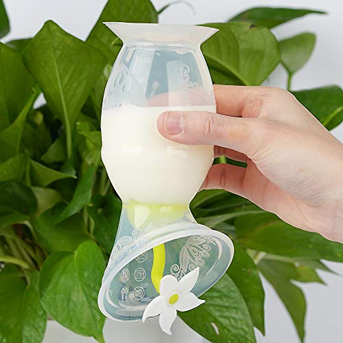 Haakaa Manual Breast Pump Silicone Breast Pump Milk Saver Milk Pump with Suction Base and Flower Stopper 100% Food Grade Silicone BPA Free (5oz/150ml) (White)