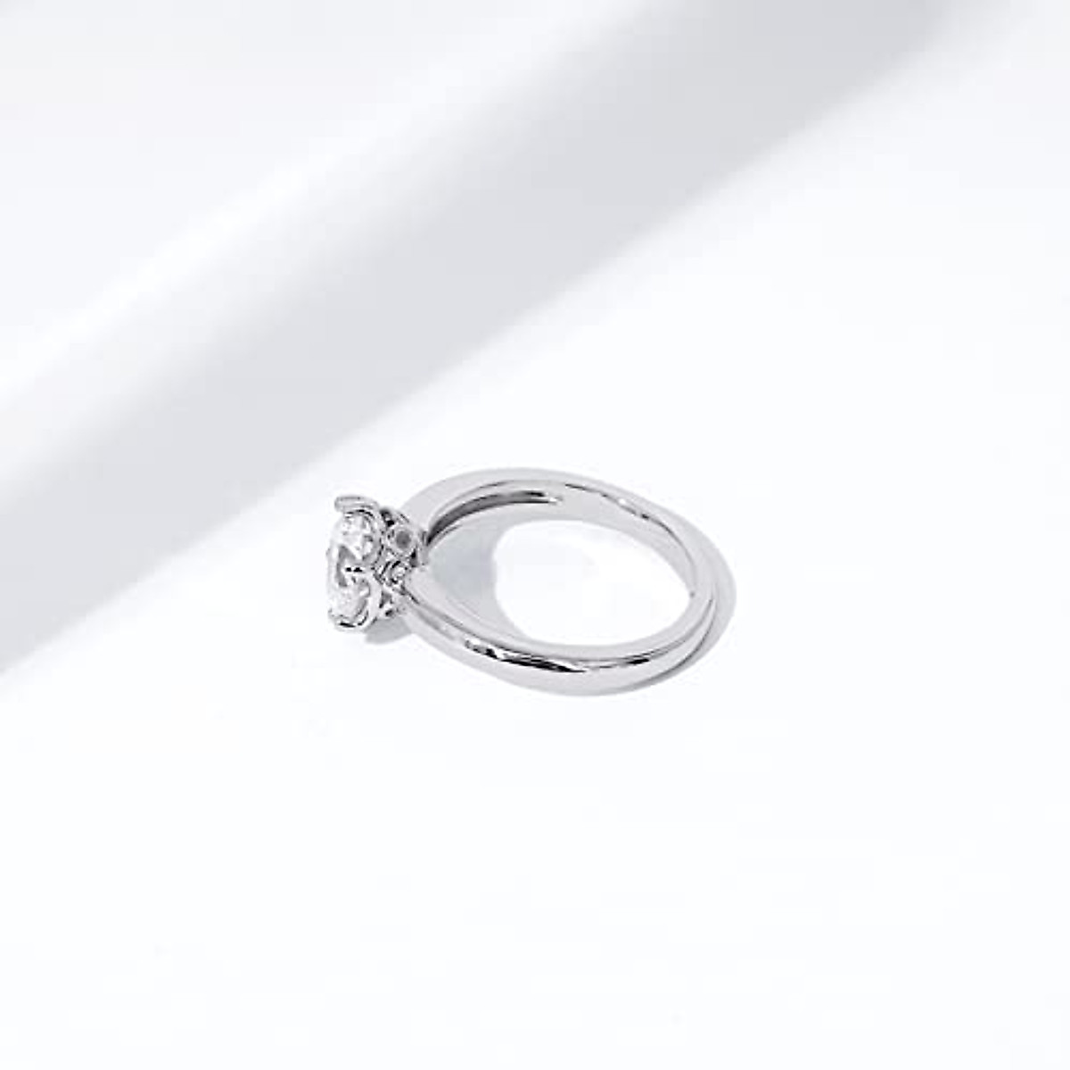 Amazon Essentials Platinum-Plated Sterling Silver Solitaire Ring set with Round Infinite Elements Cubic Zirconia (2 cttw), Size 6 (previously Amazon Collection)