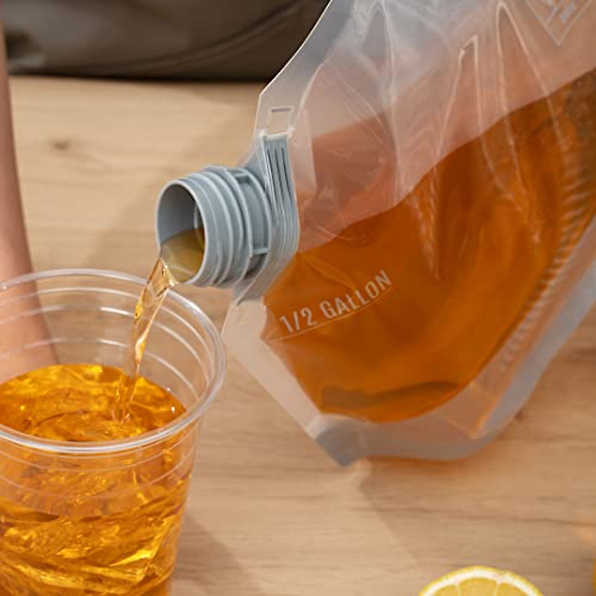 Restaurantware Cater Tek 1/2 Gallon Water Containers 10 Drink Bags - Collapsible Includes Tamper-Evident Caps Clear Plastic Beverage Bags For Catered Events Camping or Hiking Durable Handle