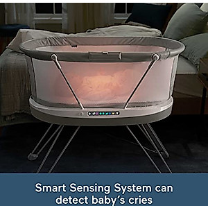 Fisher-Price Baby Bedside Sleeper Luminate Bassinet with Sound Detection Plus Customizable Lights Music and Sounds