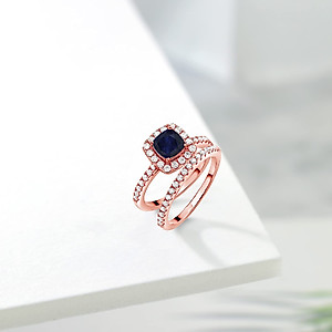 Gem Stone King 18K Rose Gold Plated Silver Cushion Blue Sapphire and Moissanite Women Wedding Engagement Ring Band Bridal Set (1.82 Cttw, Available in size 5, 6, 7, 8, 9)