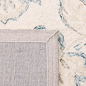 SAFAVIEH Micro-Loop Collection Area Rug - 5' x 8', Ivory & Blue, Handmade Floral Wool, Ideal for High Traffic Areas in Living Room, Bedroom (MLP477A)