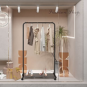 SONGMICS Clothes Rack with Wheels, 36 Inch Garment Rack, Clothing Rack for Hanging Clothes, with Dense Mesh Storage Shelf, 110 lb Load Capacity, 2 Brakes, Steel Frame, Black UHSR25BK