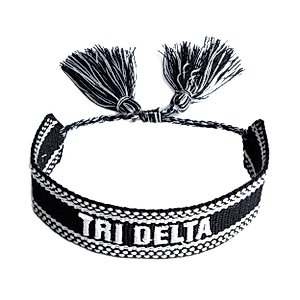 Sorority Shop Delta Delta Delta Bracelet — Woven Bracelet, Black and White Design with Tri Delta Sorority Name and Tassels, Greek Sorority Jewelry and Big Little Sorority Gifts